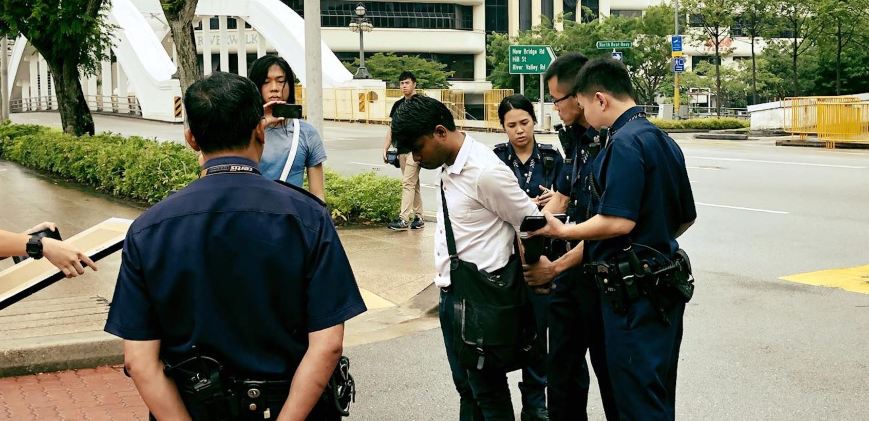 Activist arrested by Police outside of Parliament House after standing ...